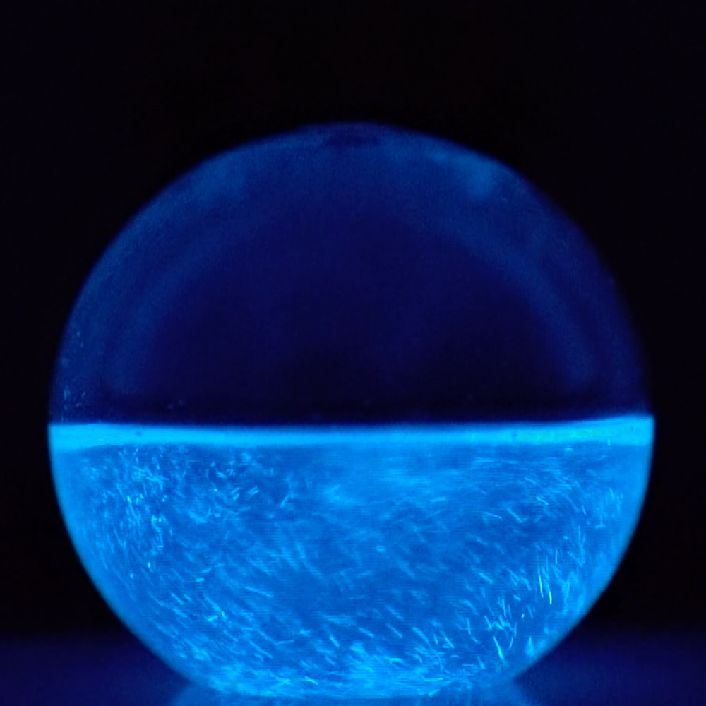 The Bioluminescent Bio-Orb on a stir plate | PyroFarms